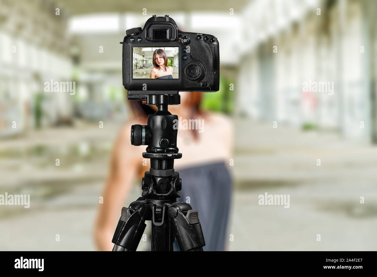 Taiwanese Chinese Vlogger posing for social media photos viewed through ...