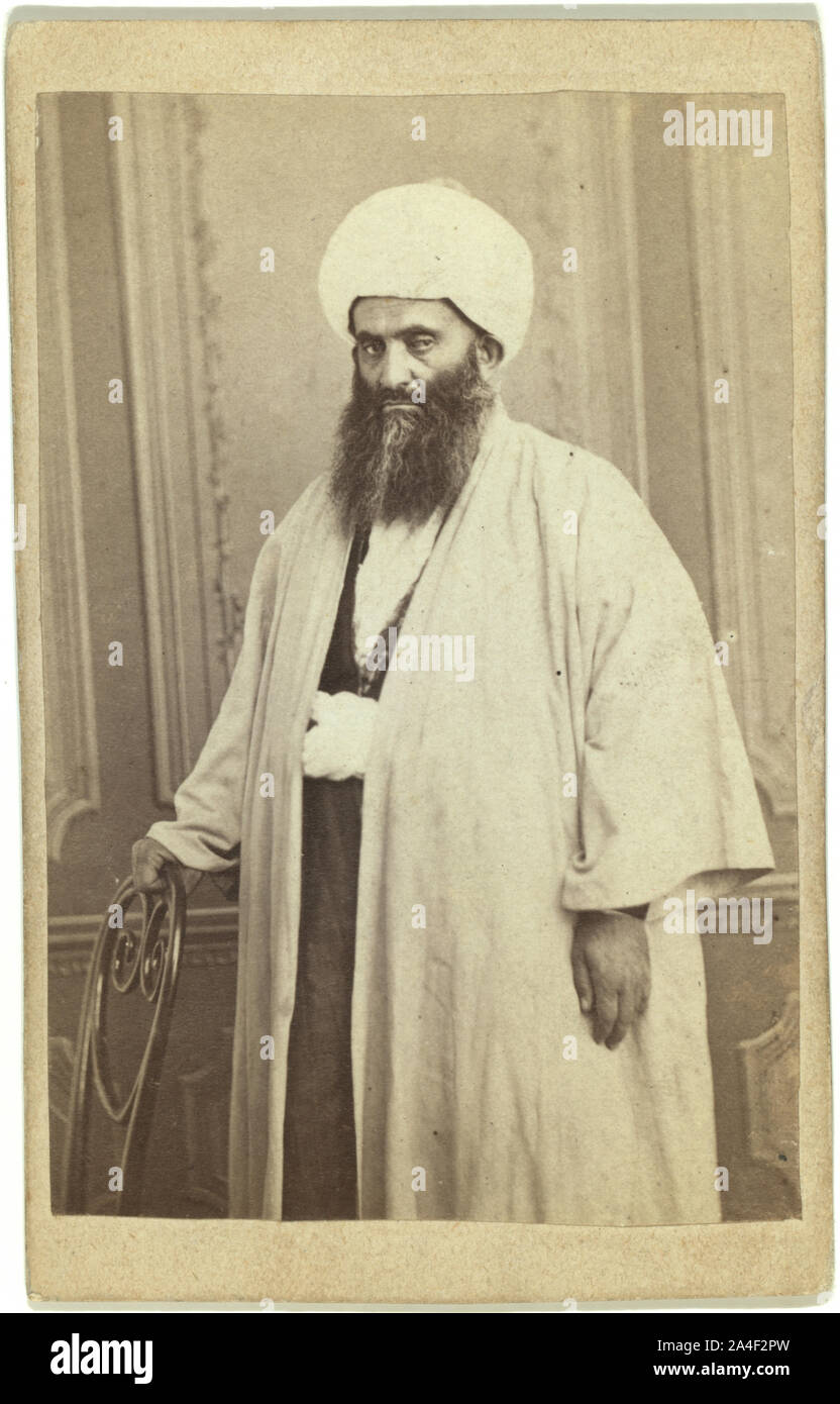 Three-quarters length portrait of a mullah Stock Photo - Alamy