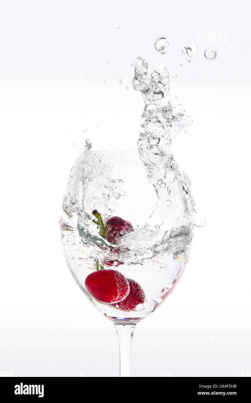 Red cherries in sparkling water hi-res stock photography and images - Alamy
