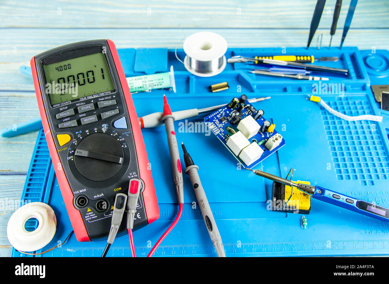 The electrician's workplace. Electronics. Schemes soldering iron ...