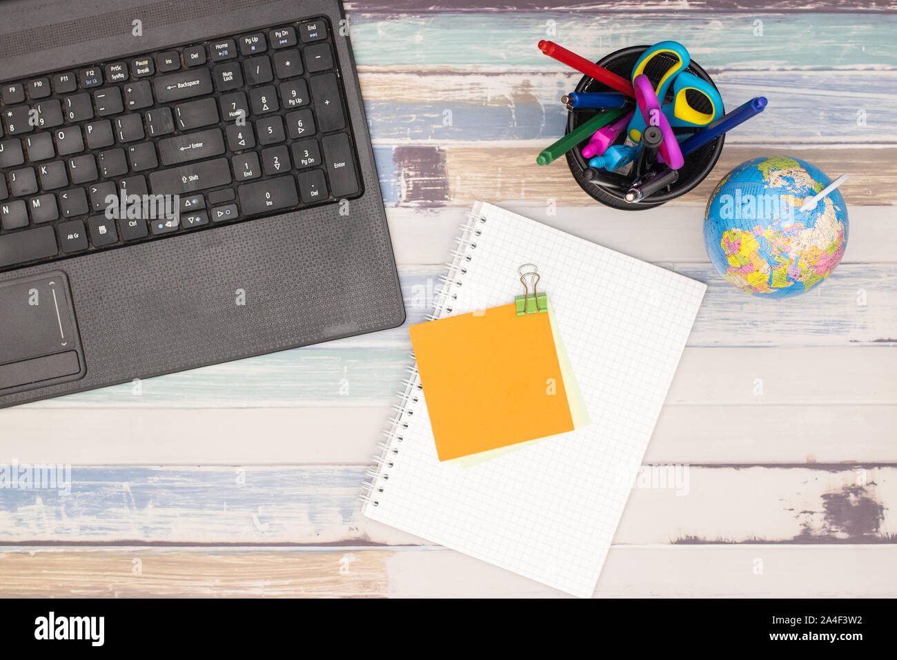 op view of office table. Office supplies on the table Stock Photo - Alamy