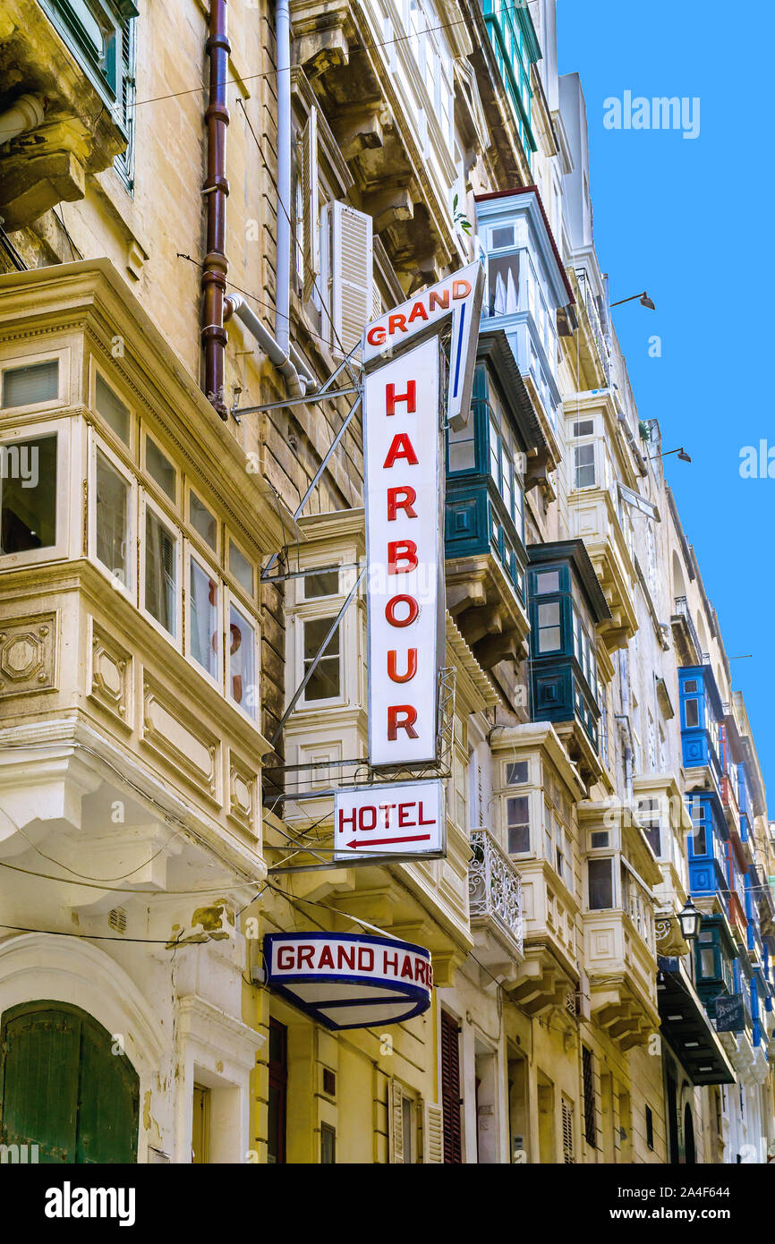 Typical Maltese residential architecture with brightly coloured timber ...