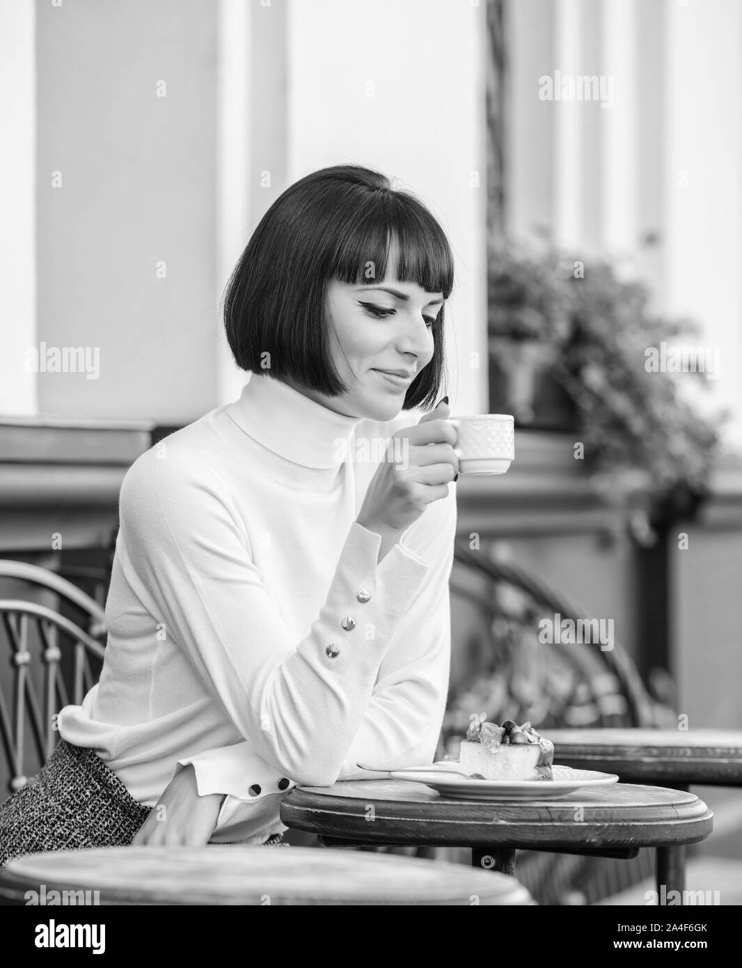 Girl relax cafe with cake dessert. Gourmet concept. She loves sweets ...