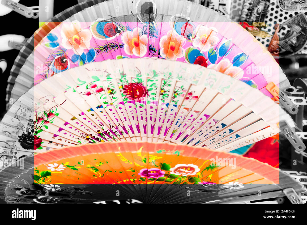 Handmade colored fans with flowers Stock Photo - Alamy