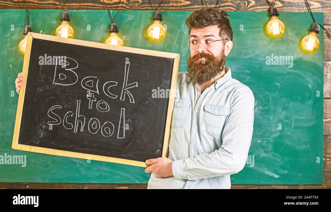 Education and studying concept. Man with beard and mustache on cheerful ...