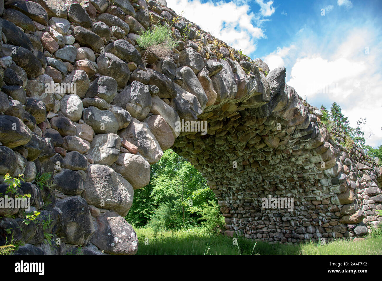 Bridge with arches, built of large stones Stock Photo - Alamy