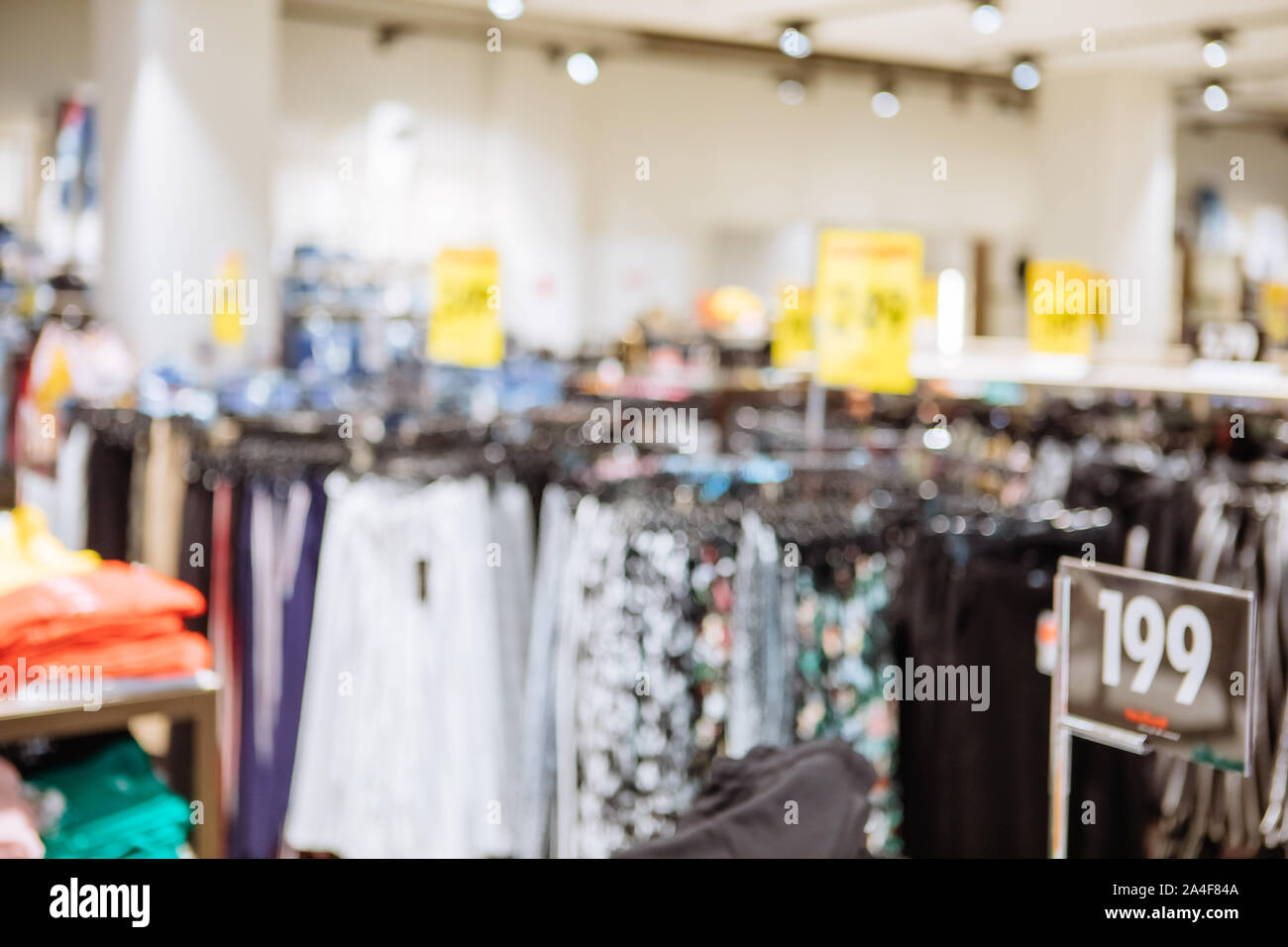 blurred picture of clothes store Stock Photo - Alamy