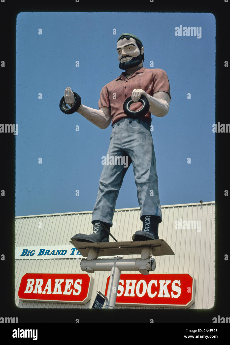 Tire Man Big Brand tire statue, Van Nuys, California Stock Photo - Alamy