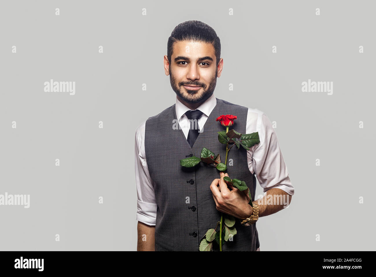 Man red rose in hand hi-res stock photography and images - Alamy