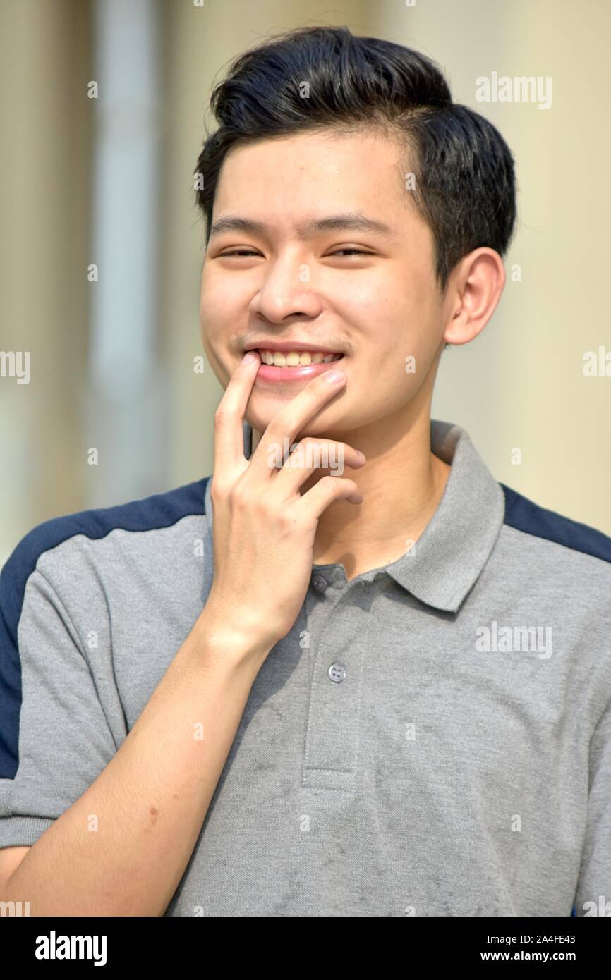 Good Looking Filipino Male Thinking Stock Photo - Alamy