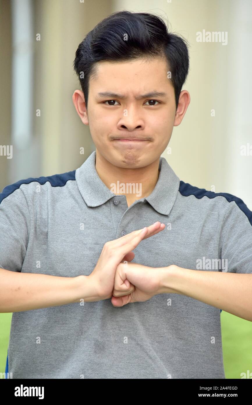 An Angry Filipino Boy Stock Photo - Alamy