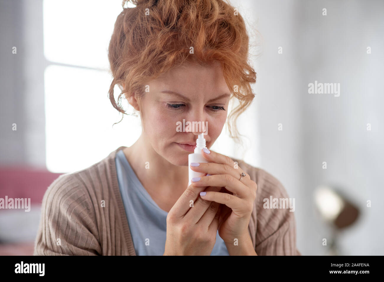 Woman cold red nose hi-res stock photography and images - Alamy