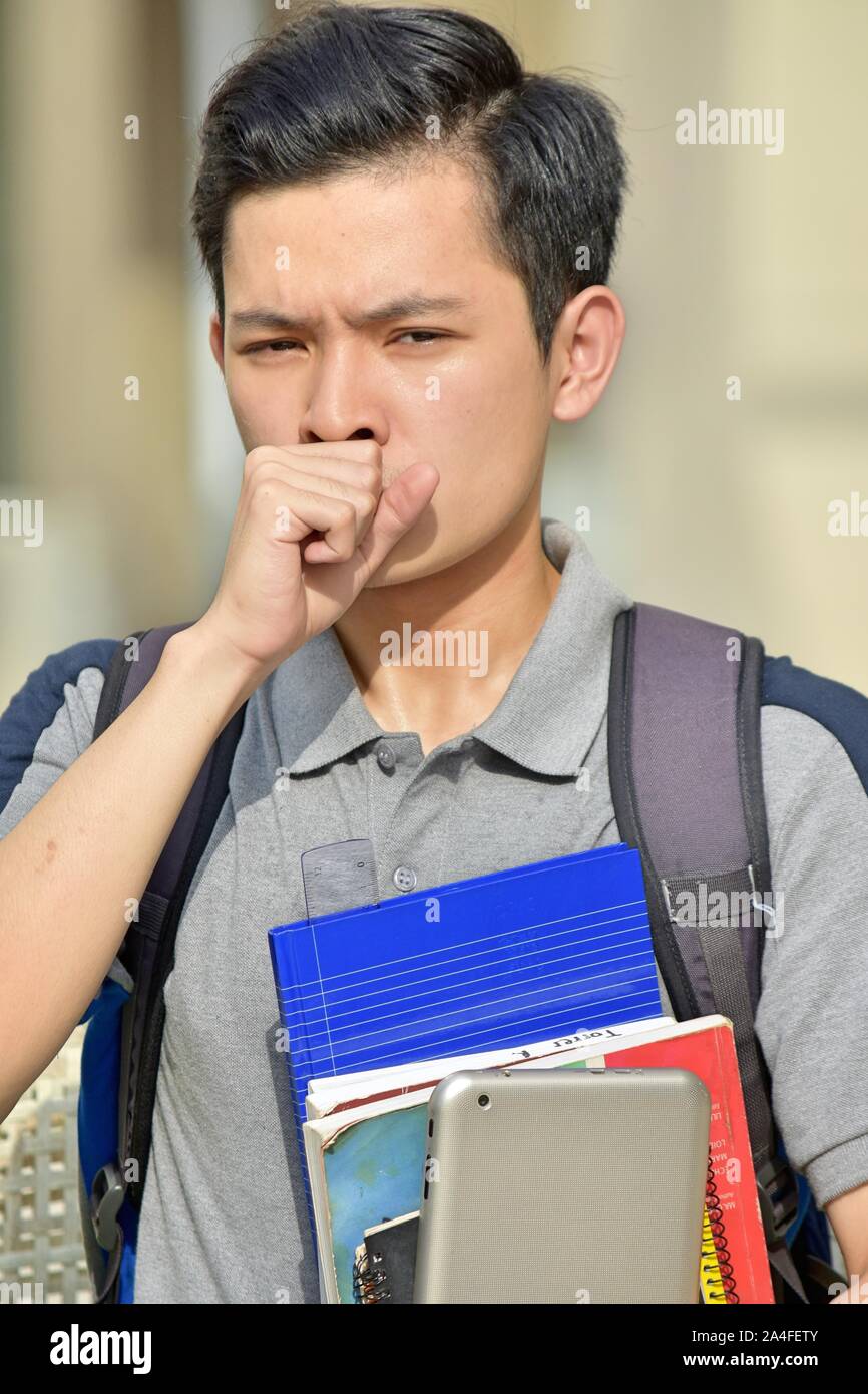 Boy Student Coughing Stock Photo - Alamy