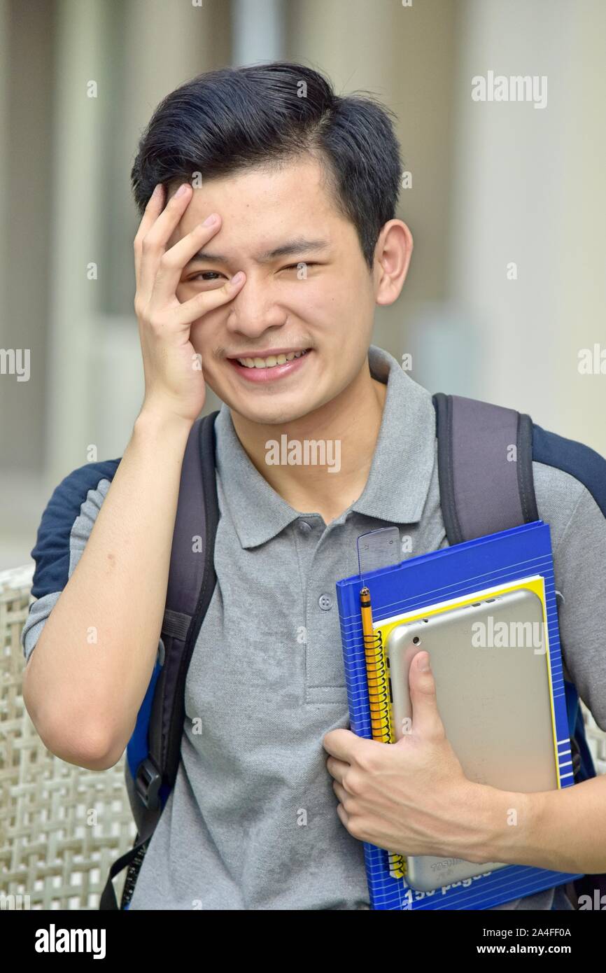 Forgetful Handsome Boy Student Stock Photo - Alamy