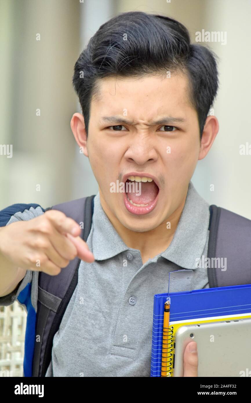 Student And Anger With Books Stock Photo - Alamy