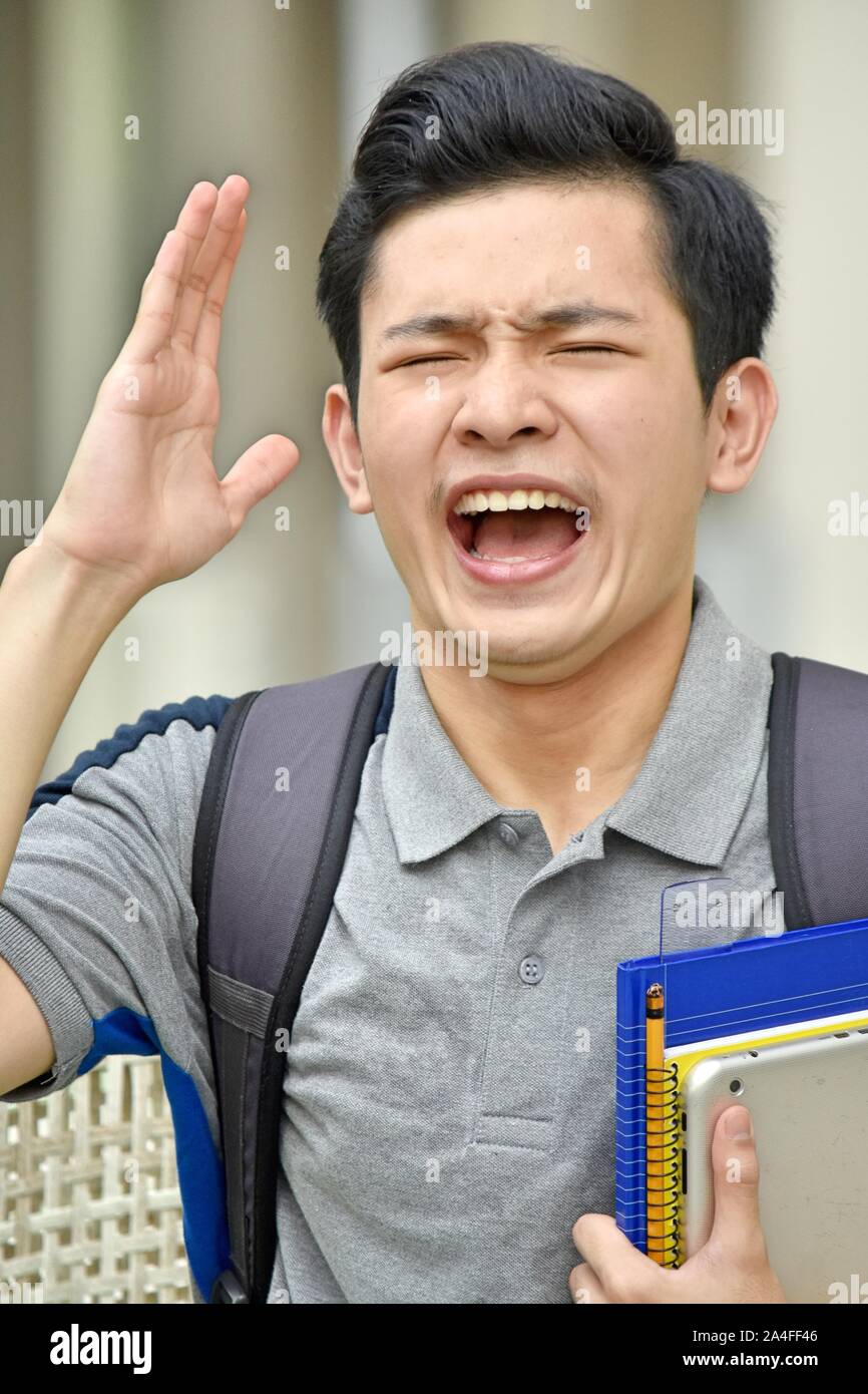 Laughing male student writing hi-res stock photography and images - Alamy