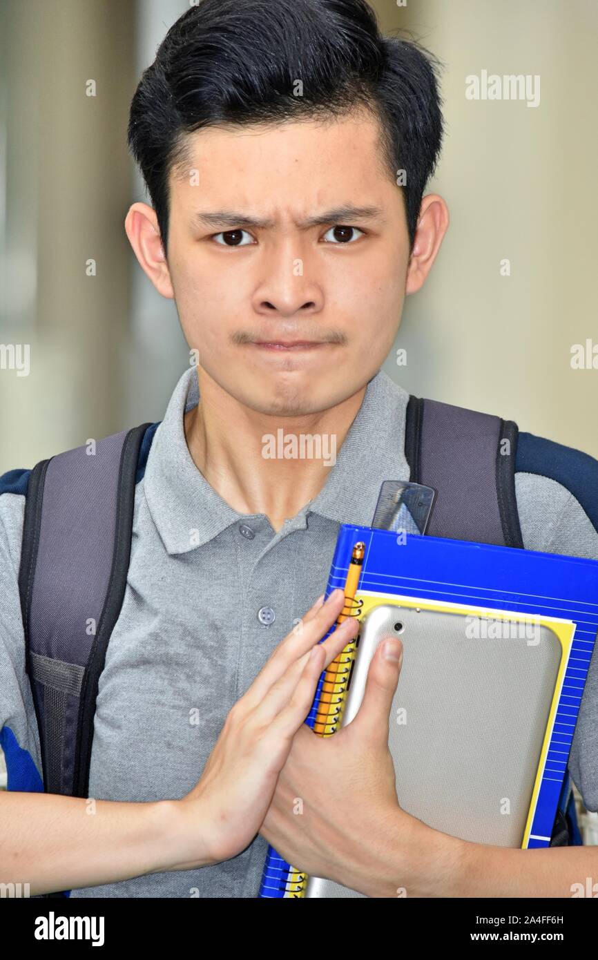 Mad Young Diverse Male Student Stock Photo - Alamy