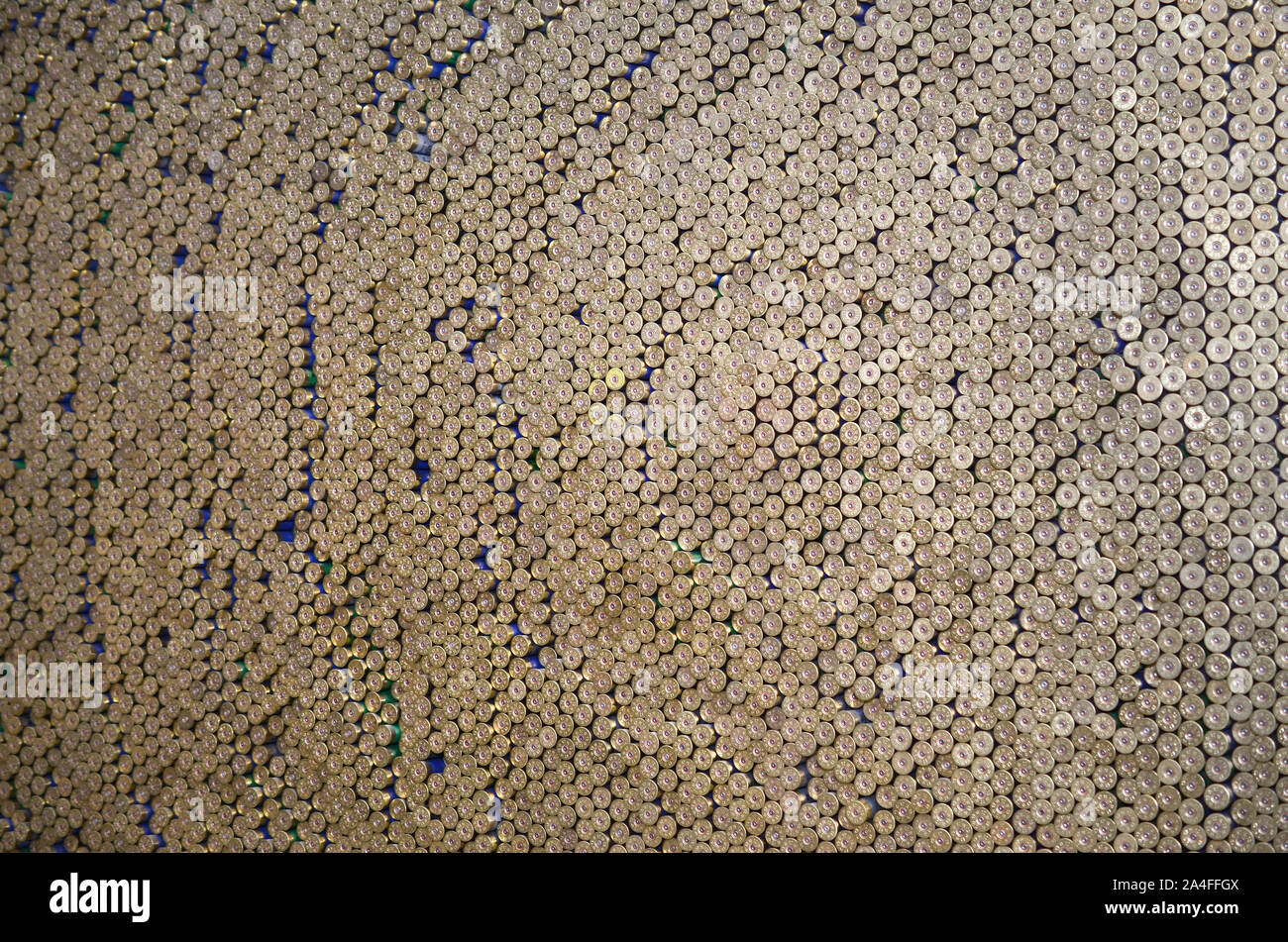 Pattern of 12 gauge cartridges for shotgun bullets. Shells for hunting ...