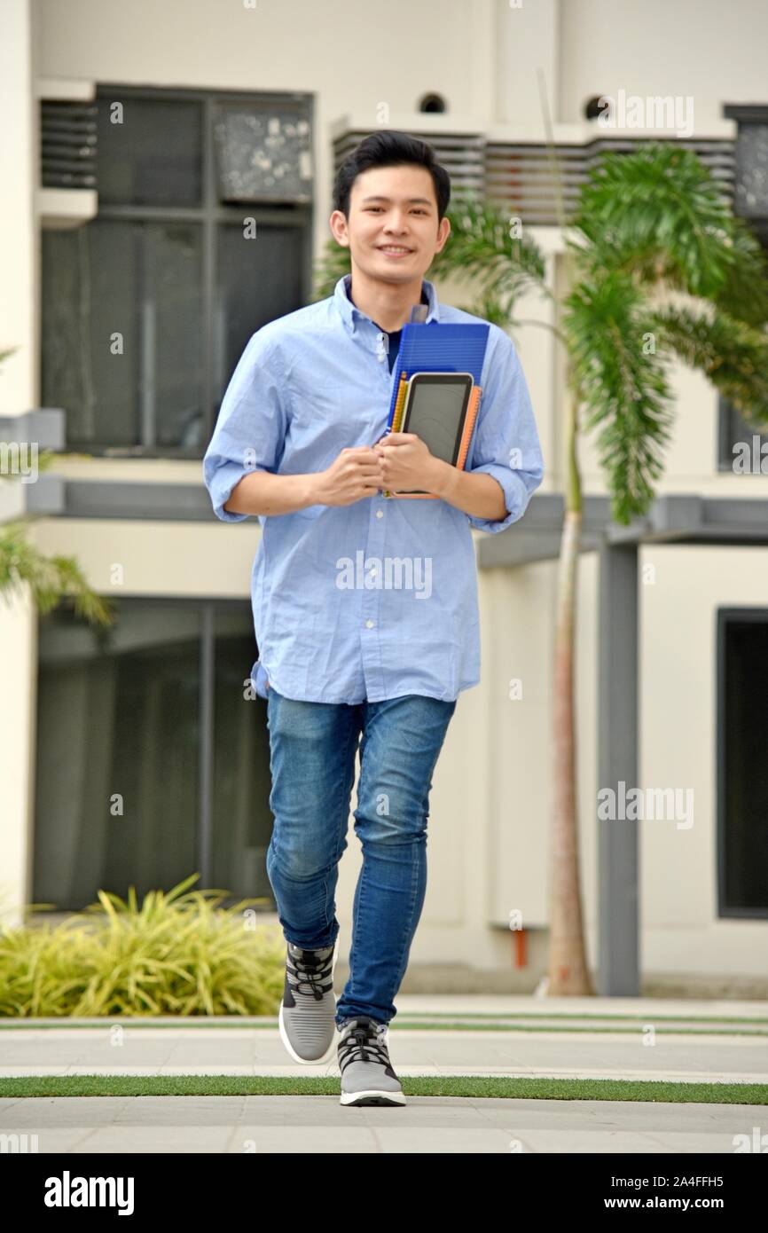 University Filipino Boy Student And Happiness Walking Stock Photo - Alamy