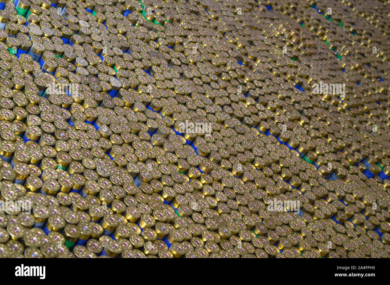 Pattern of 12 gauge cartridges for shotgun bullets. Shells for hunting ...