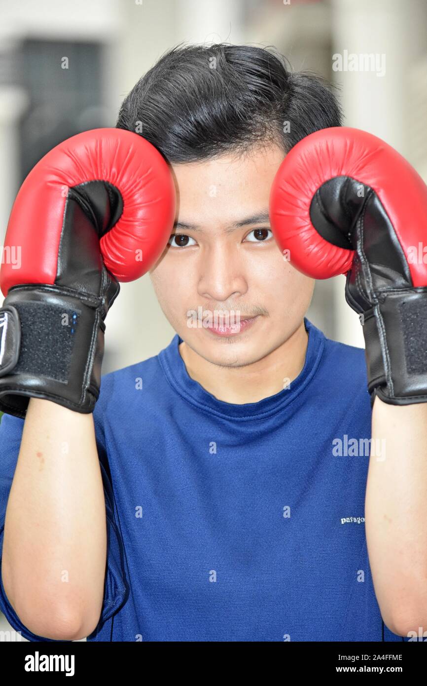 Serious Minority Person Wearing Boxing Gloves Stock Photo - Alamy