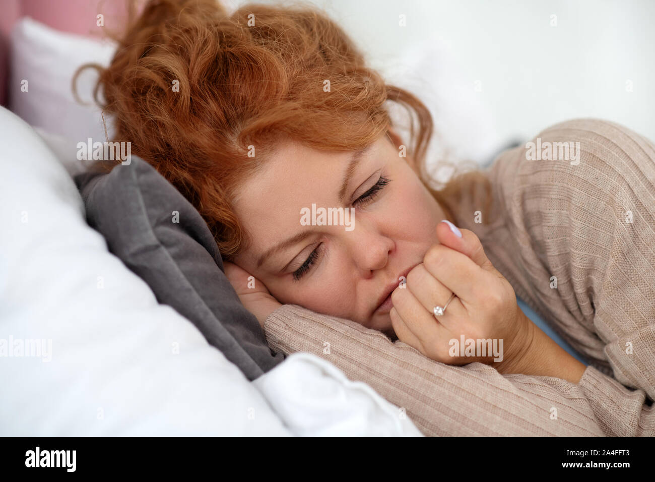 Woman having no energy while suffering from cold Stock Photo - Alamy