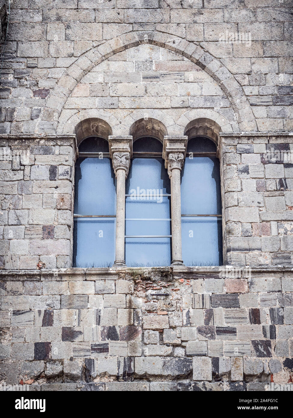 Triple lancet window of Italian medieval cathedral Stock Photo - Alamy