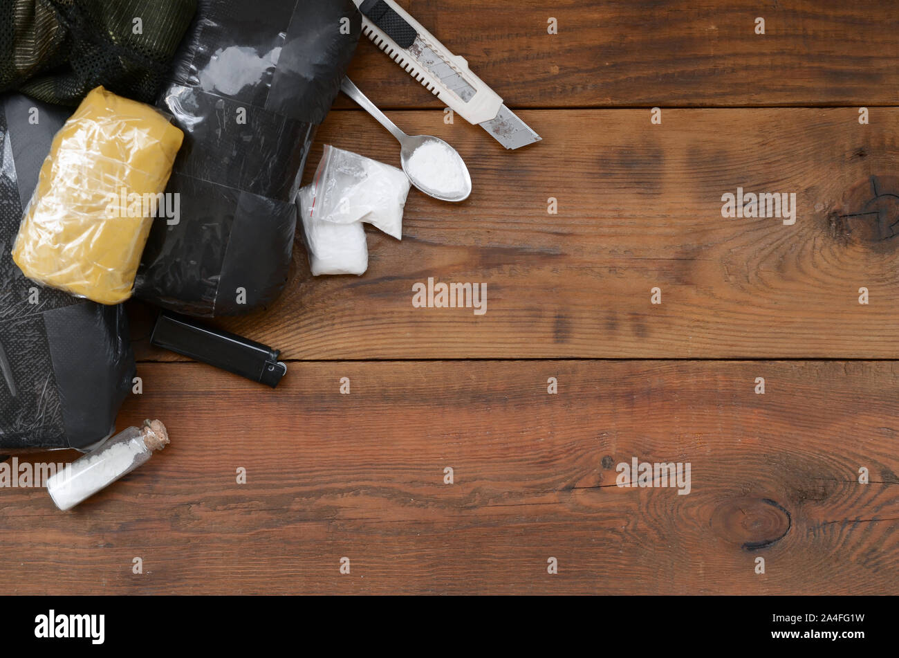 Drug dealer stuff. Many big packages of heroin powder and items for ...