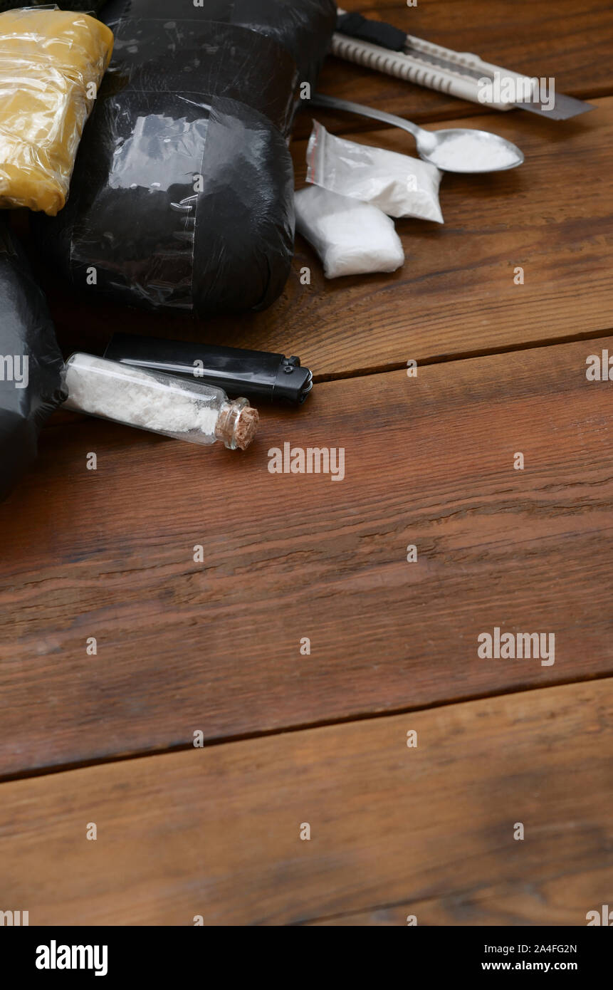 Drug dealer stuff. Many big packages of heroin powder and items for ...