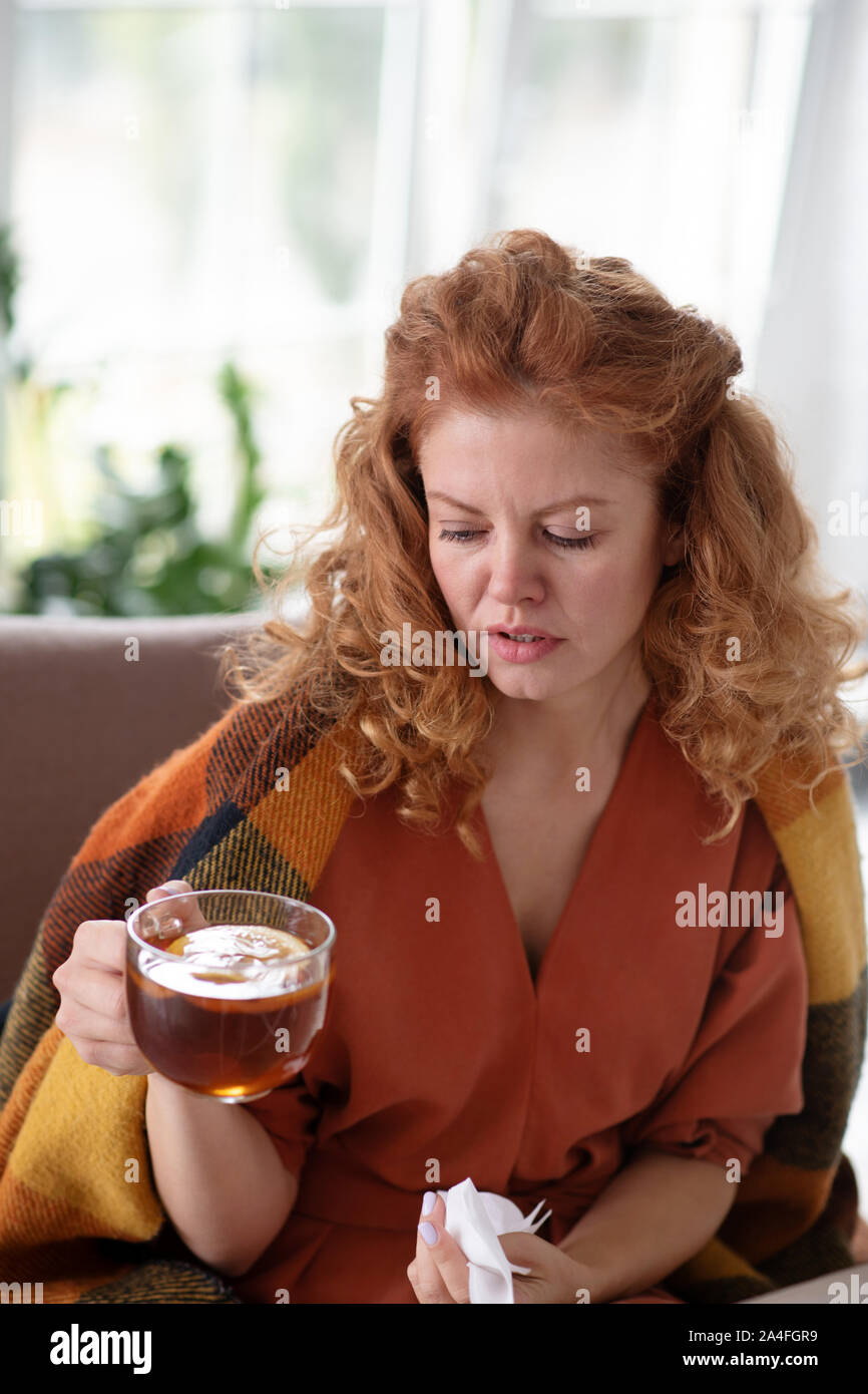 Young woman cold red nose hi-res stock photography and images - Alamy
