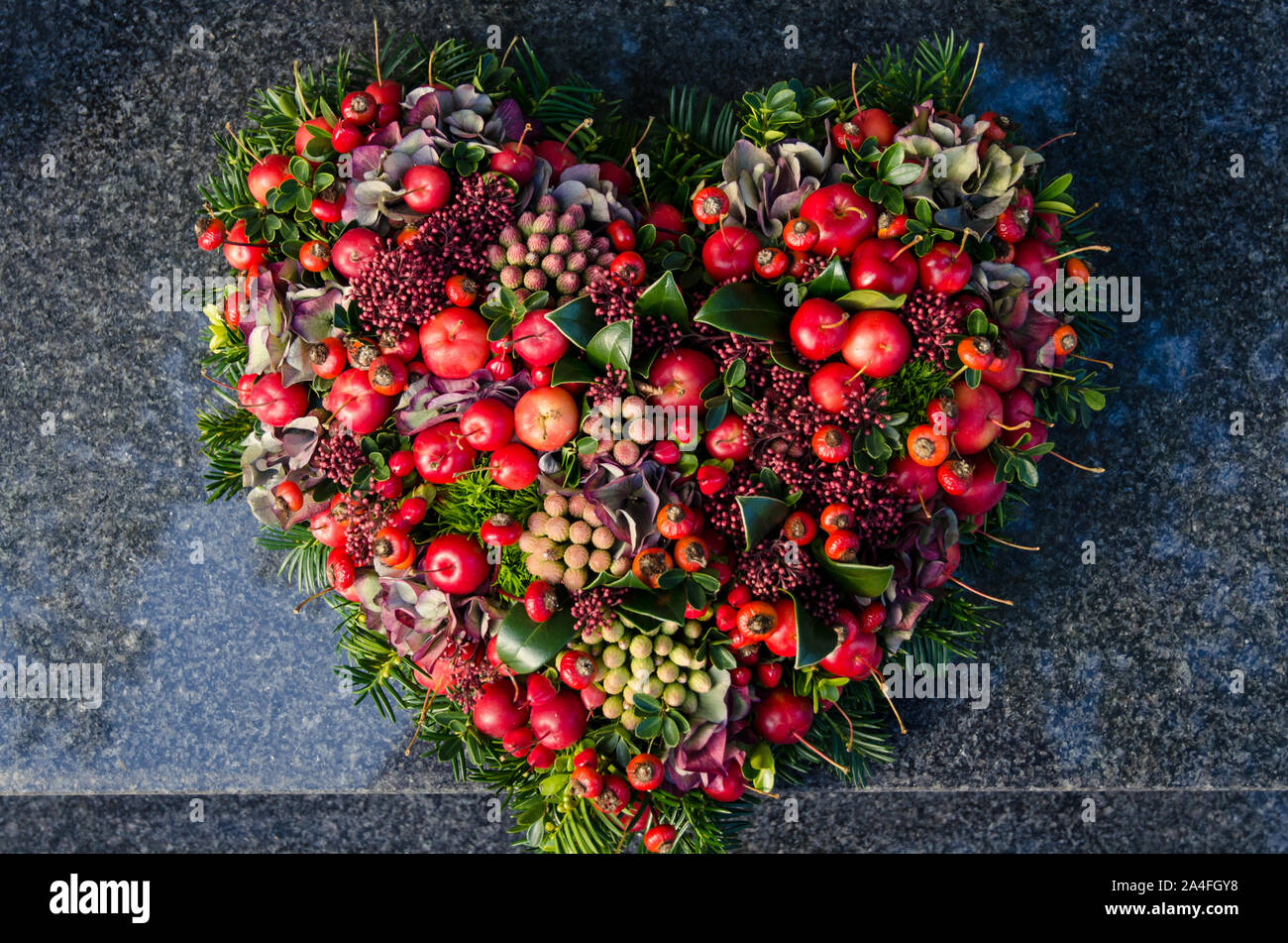 red burial decoration in heart shape Stock Photo - Alamy