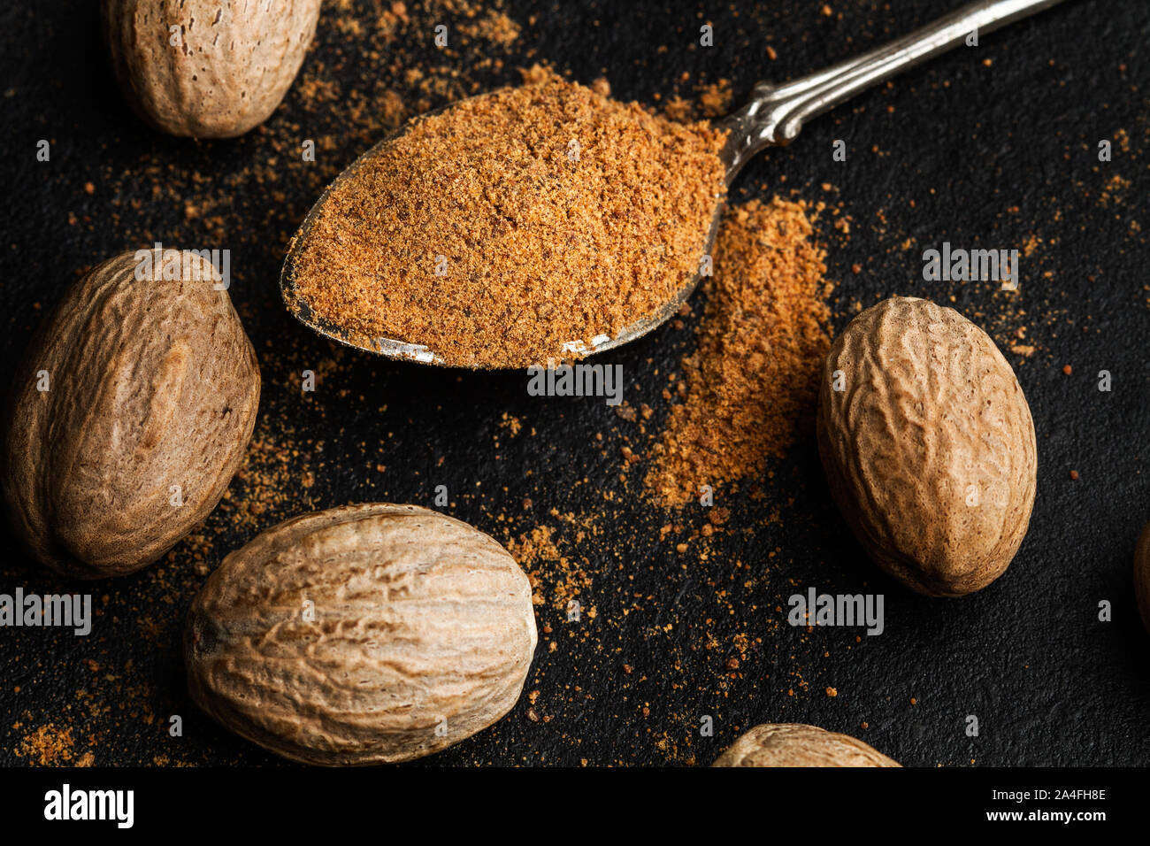 Ground nutmeg powder on table hi-res stock photography and images - Alamy