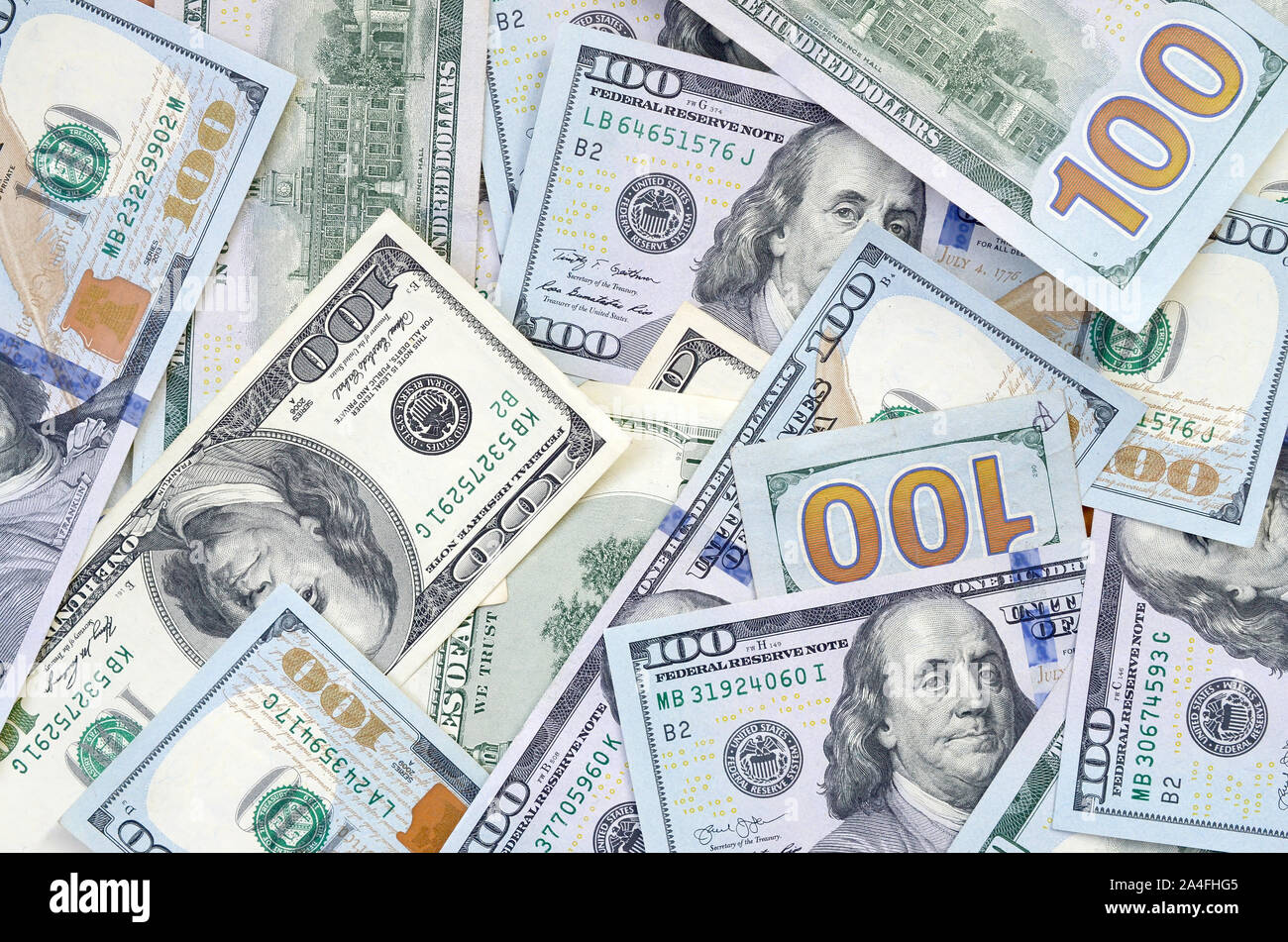 Top view of one hundred dollar banknotes made background. USD currency ...