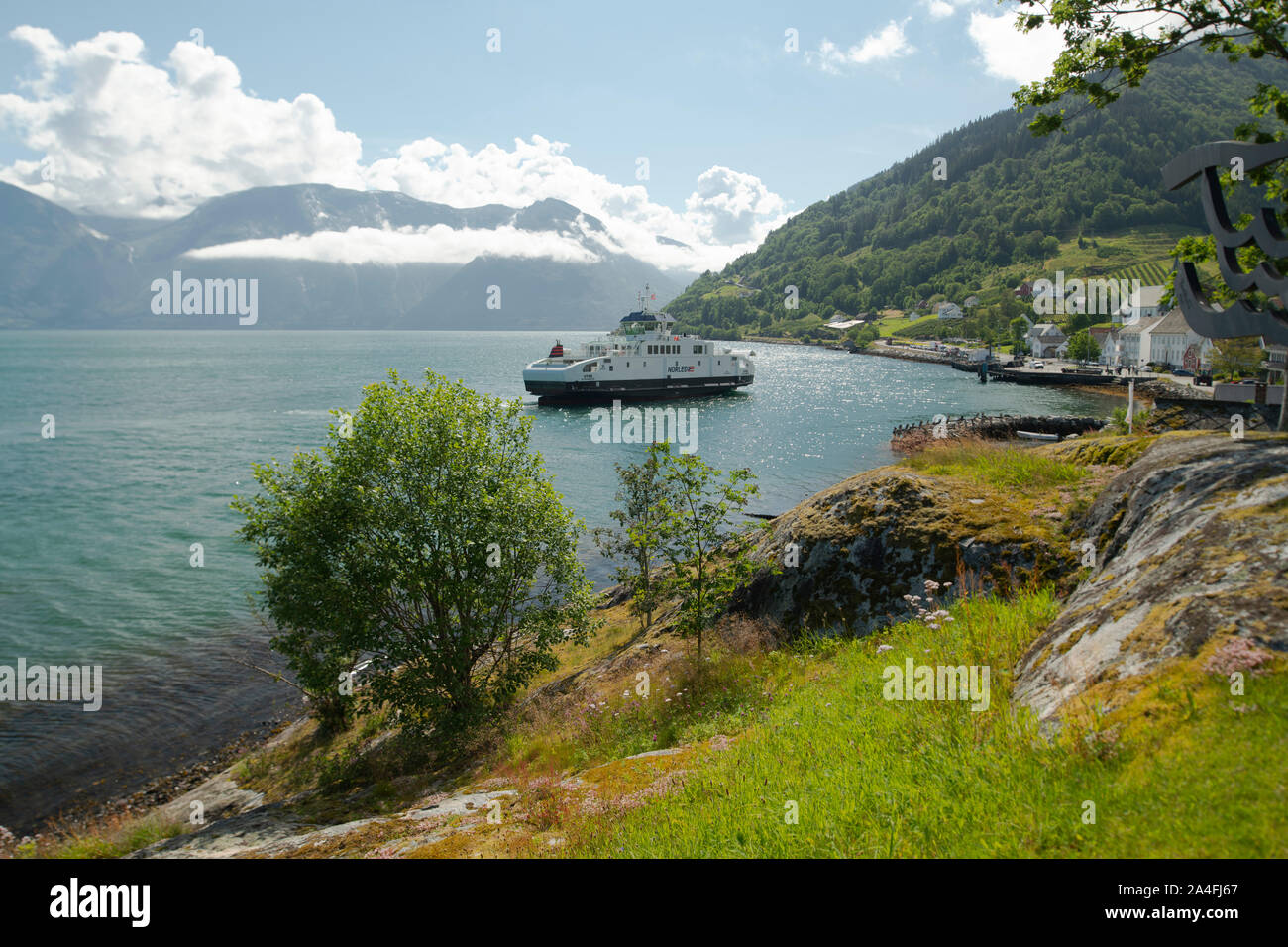 A ferry arriving in Utne on Hardanger Fjord, Vestlandet, Norway Stock ...