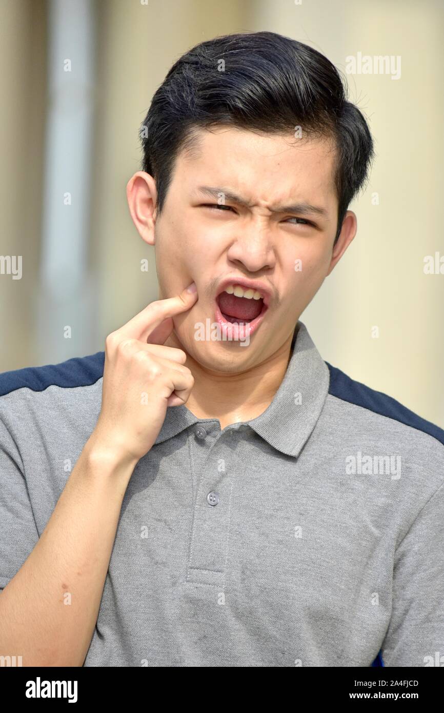 Teenager Boy With Toothache Stock Photo - Alamy