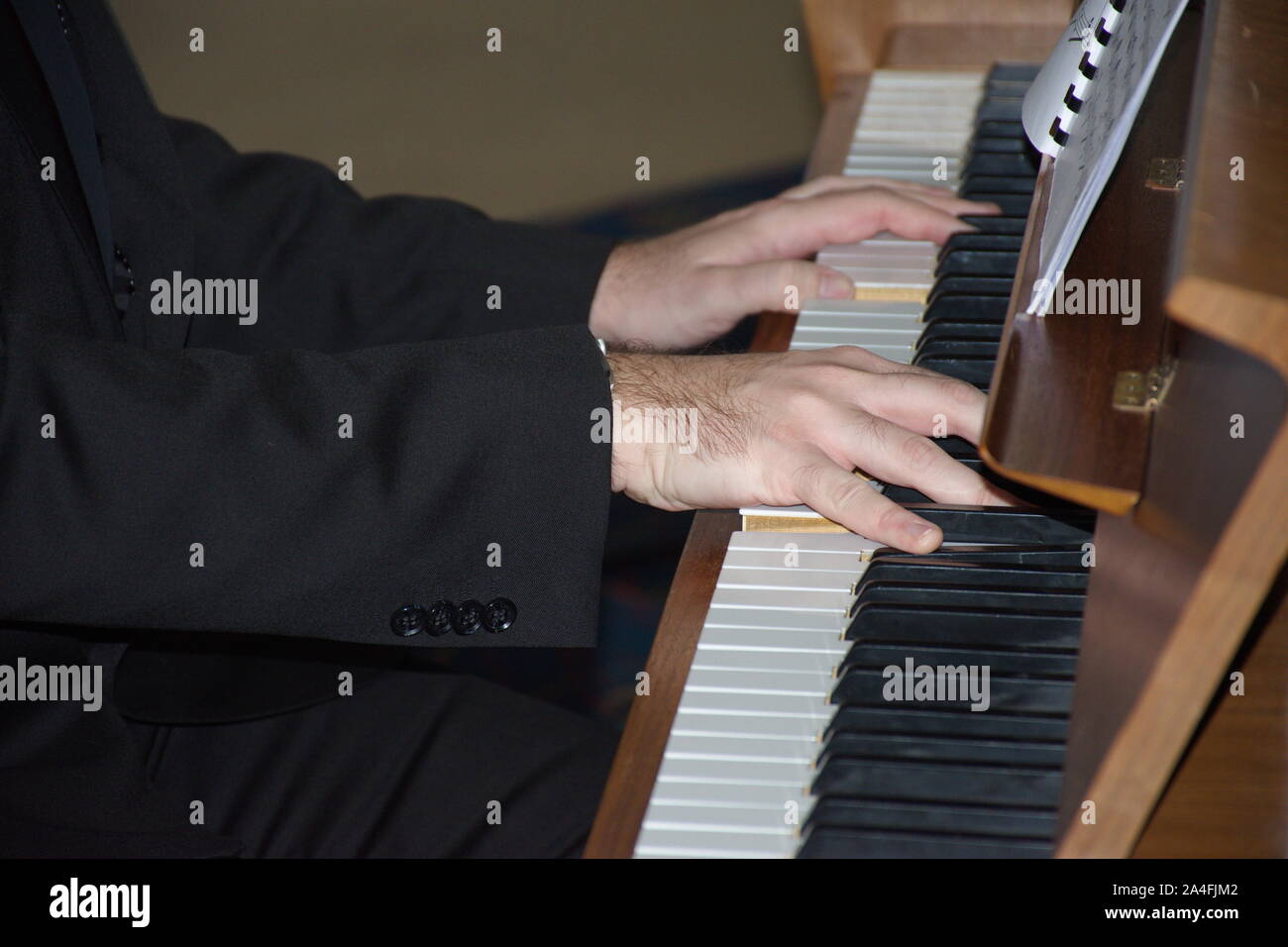 Hands playing classical piano hi-res stock photography and images - Alamy
