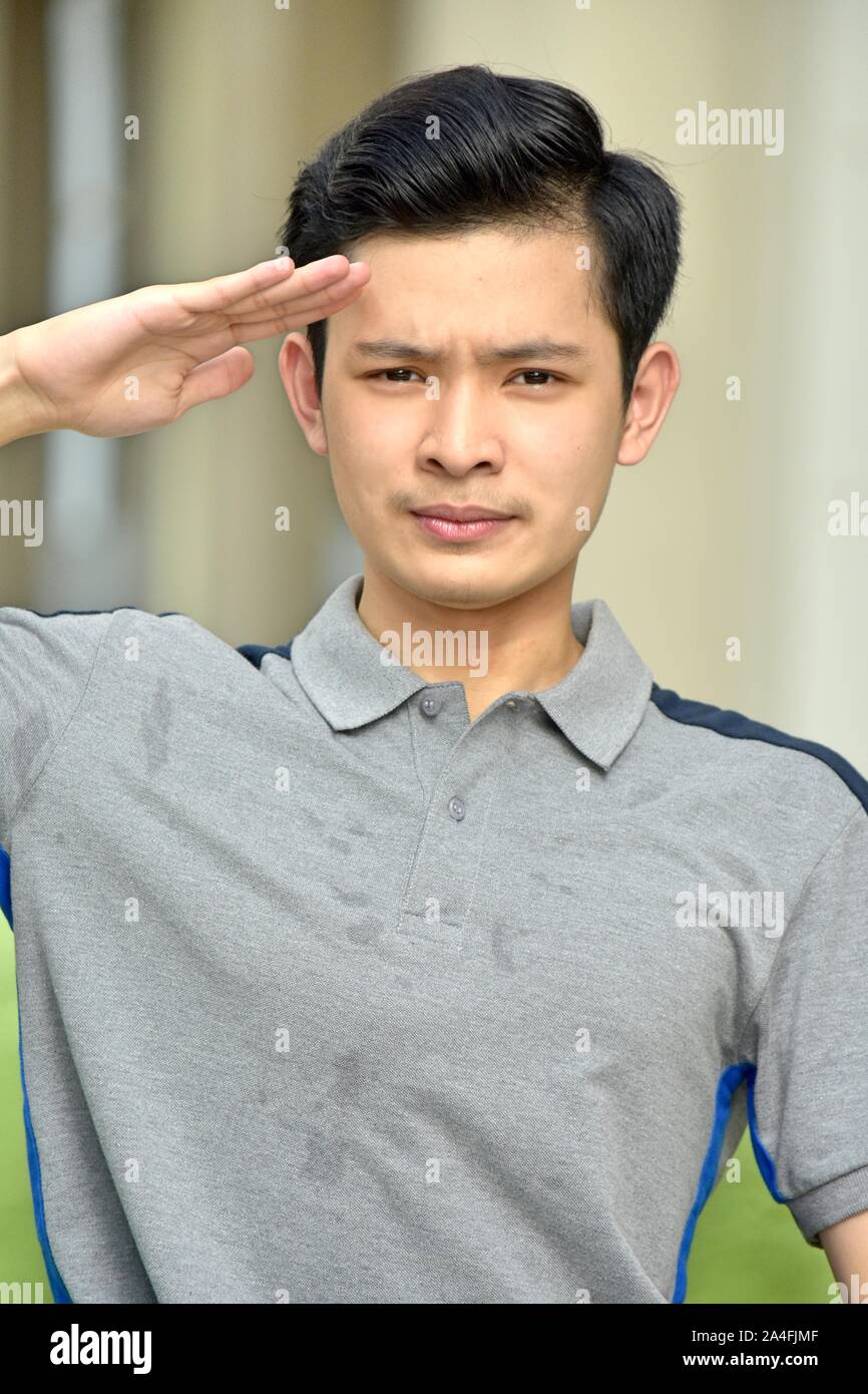Young Minority Boy Saluting Stock Photo - Alamy