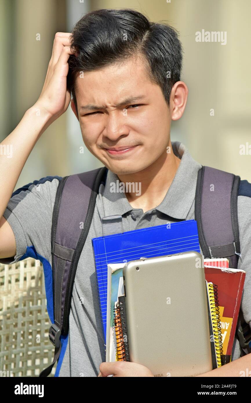 Confused Male Student Stock Photo - Alamy