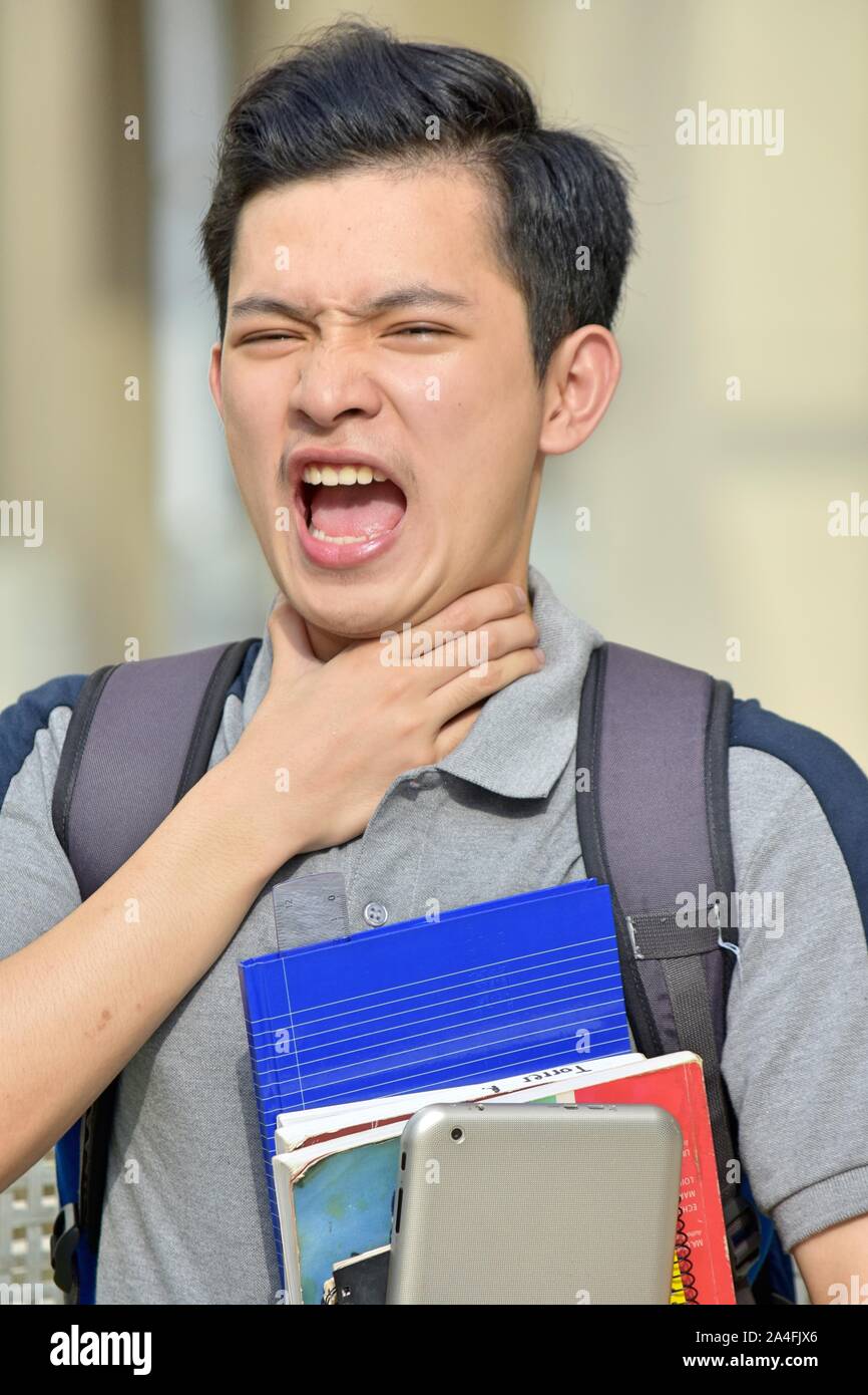 Boy choking hi-res stock photography and images - Alamy