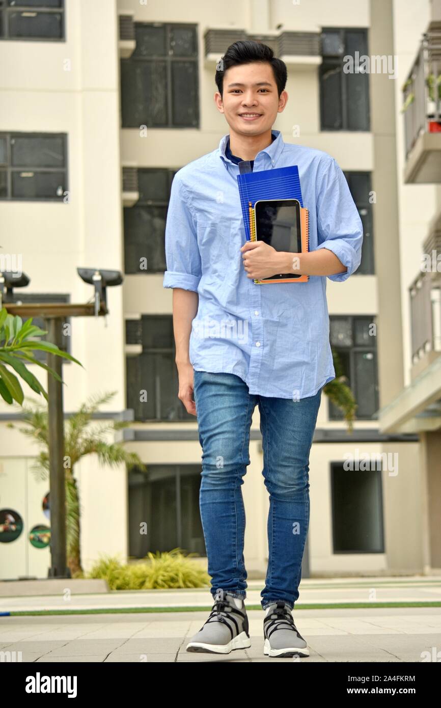 Filipino Boy Student Smiling Walking Stock Photo - Alamy