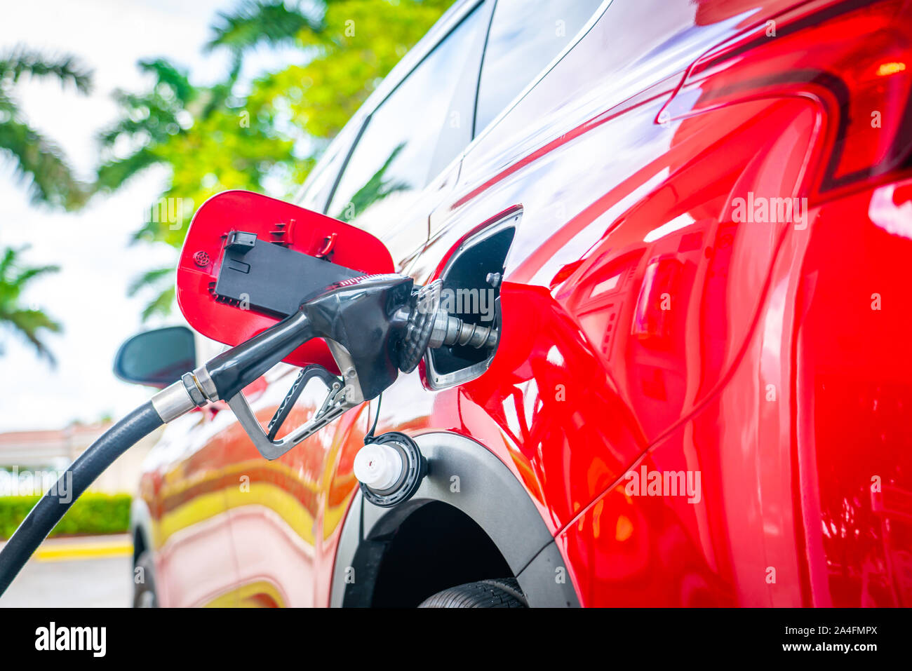 Car refueling on petrol station. Fuel pump gasoline oil. Service is ...