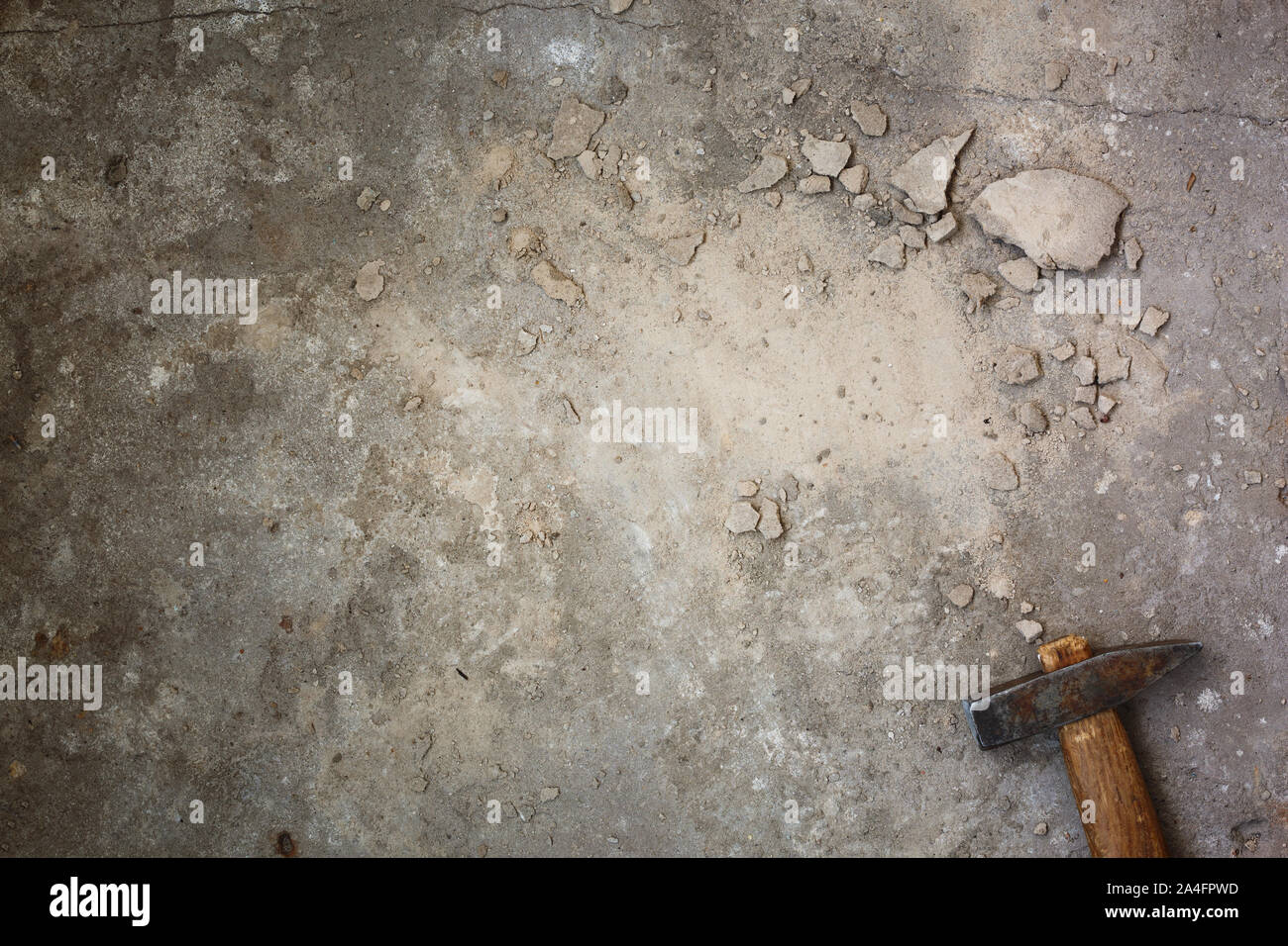Abstract concrete background with vintage hammer, crumb stucco ...
