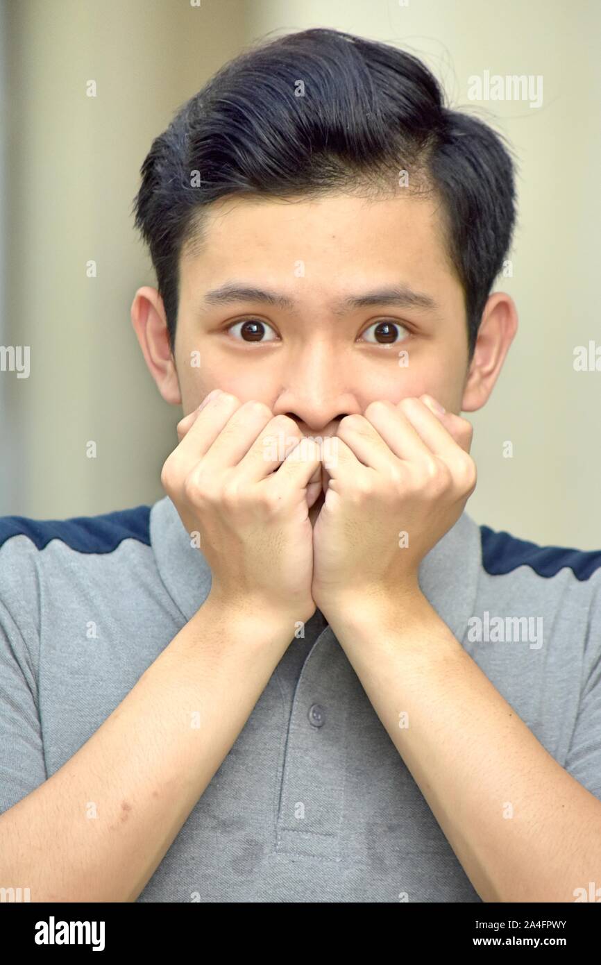 An Asian Male Afraid Stock Photo - Alamy