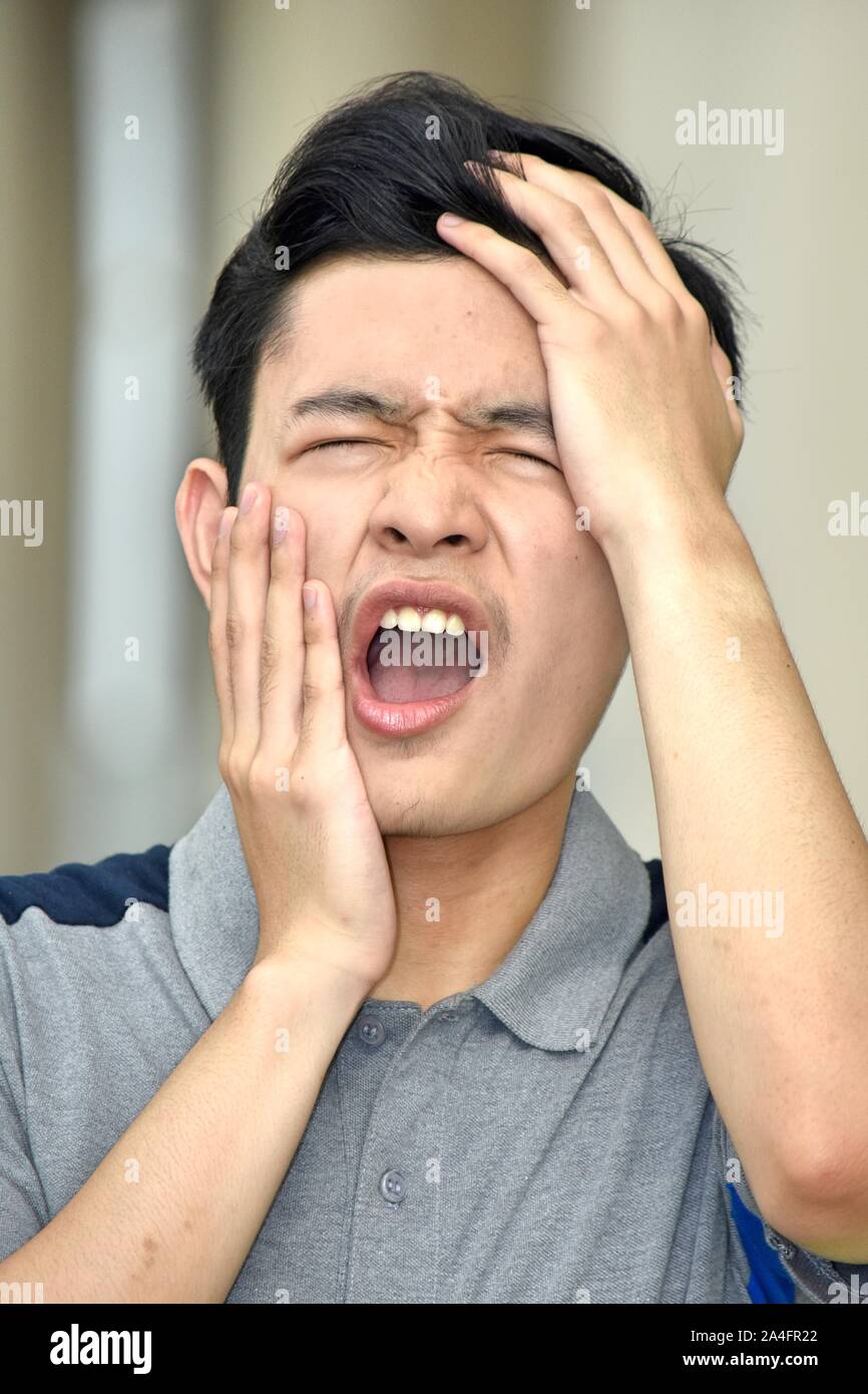 Stressed Teenager Boy Stock Photo - Alamy