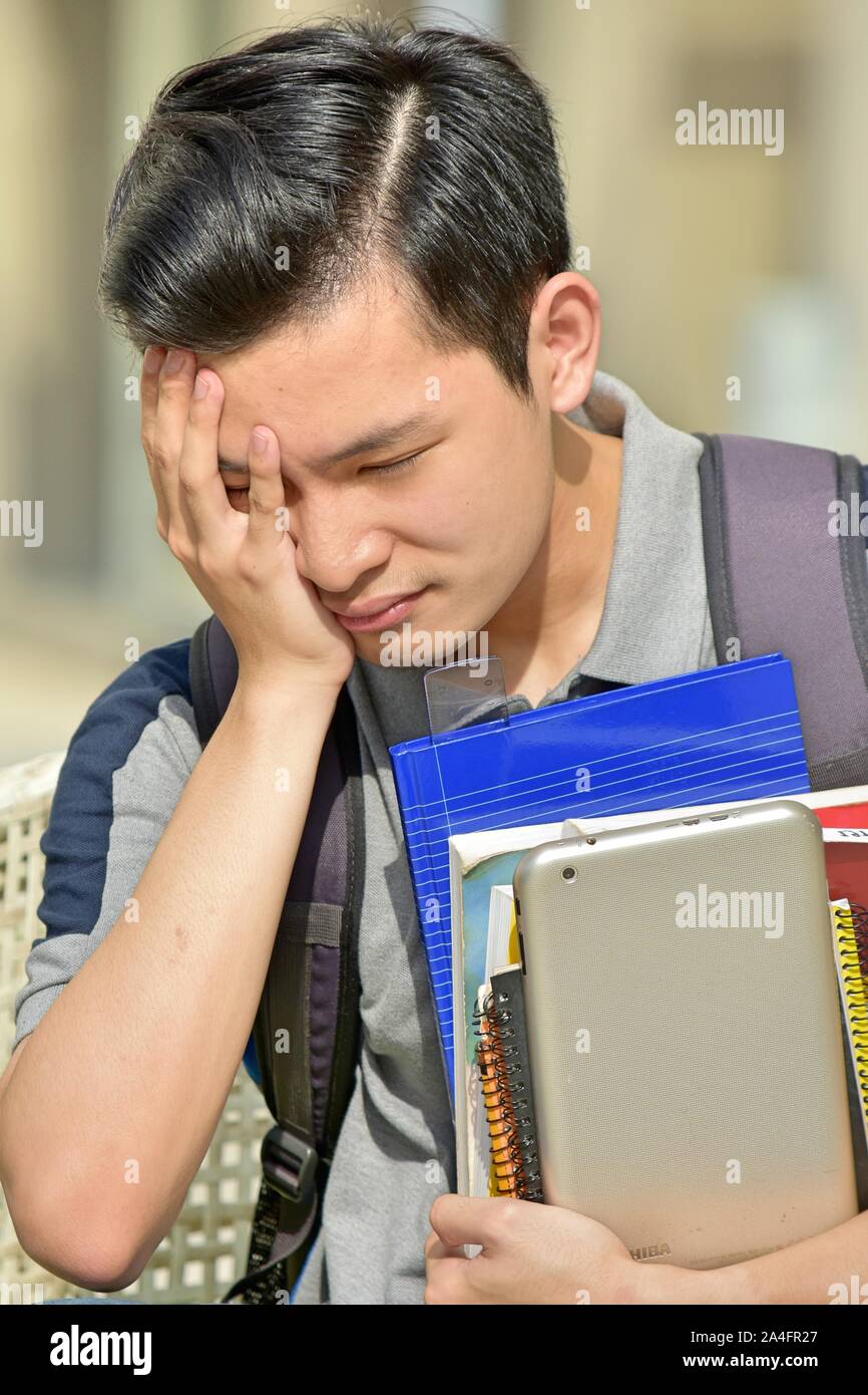 Sad Young Chinese Person Stock Photo - Alamy