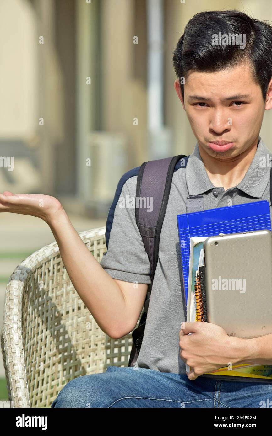 An Undecided Boy Student Stock Photo - Alamy
