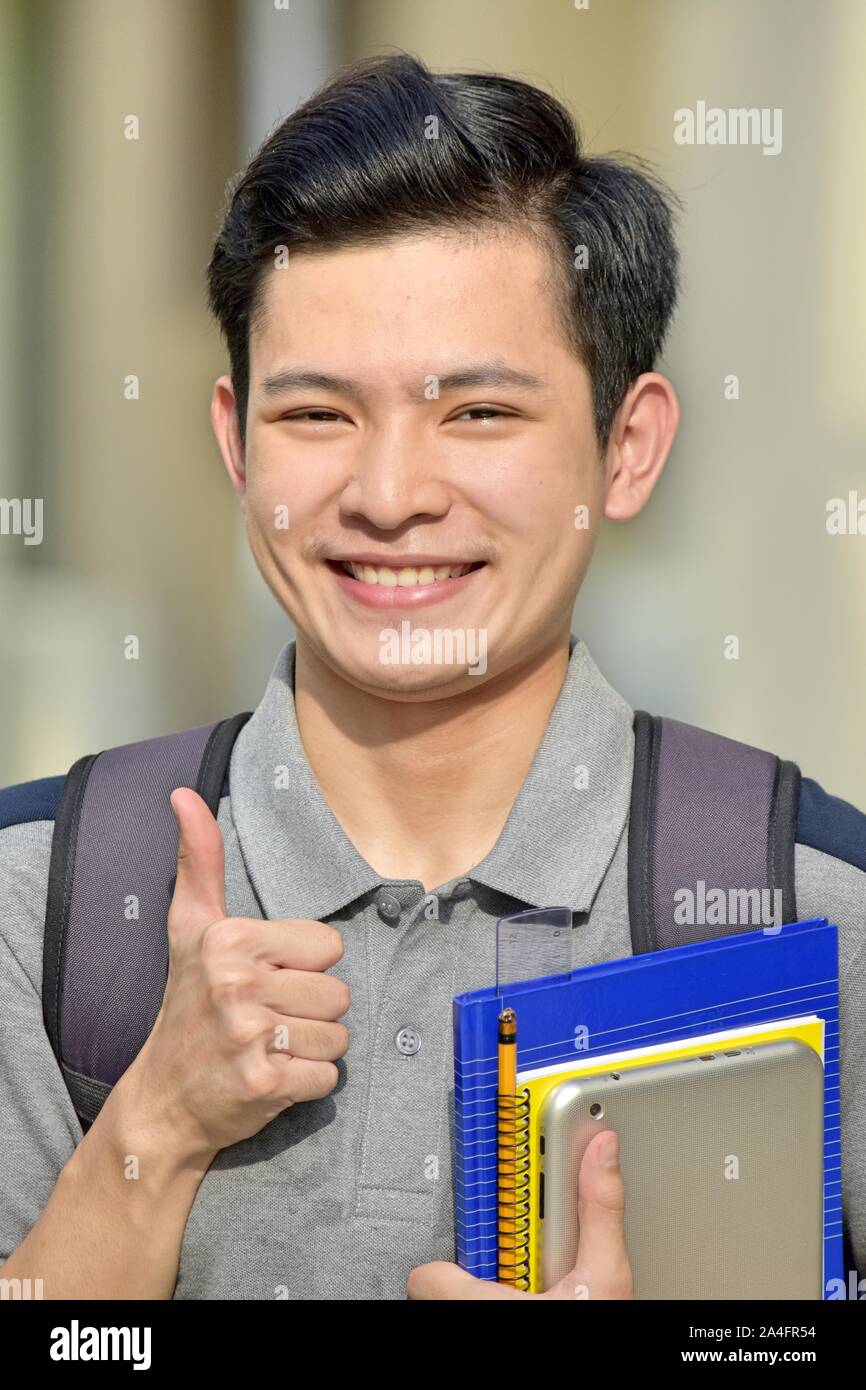 Successful Boy Student With Notebooks Stock Photo - Alamy