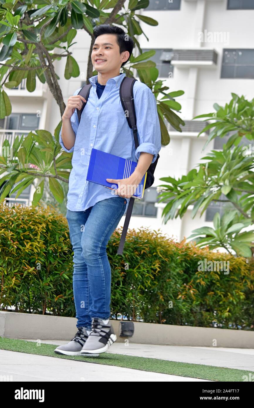 Happy Youthful Filipino Male Student Walking Stock Photo - Alamy