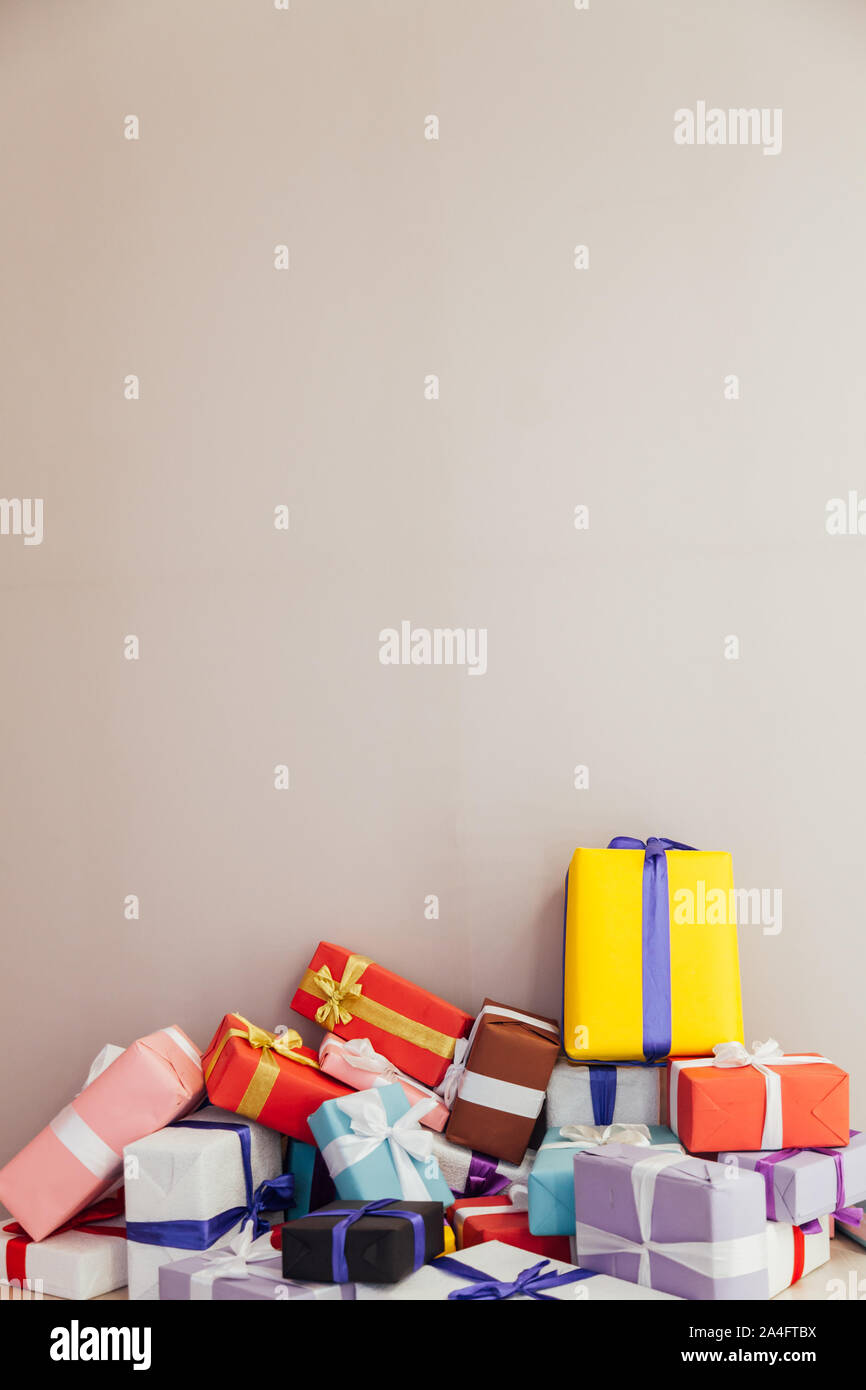 lots of colorful gifts for the birthday party Stock Photo - Alamy