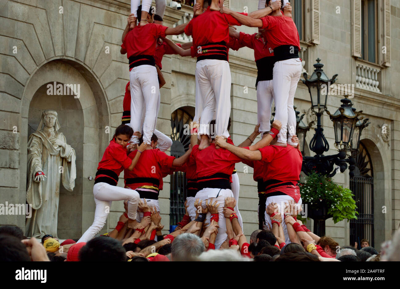Castellers building castells/human towers at the 2019 La Merce Festival ...